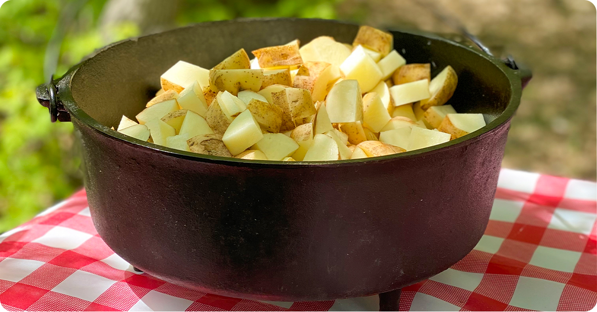 Easy, Cheesy Dutch Oven Potatoes | IFA's Helping to Grow Blog
